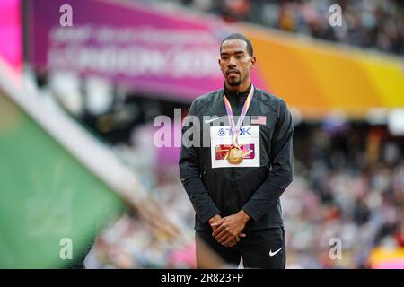 Christian Taylor at the award ceremony and receiving the medal at the ...