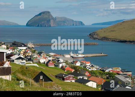 view of fiord Vagafjordur and village of Midvagur, Denmark, Faroe ...