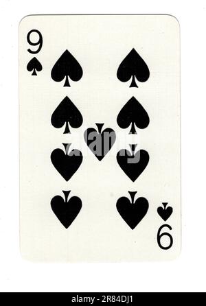 A vintage nine of spades playing card isolated on a white background ...