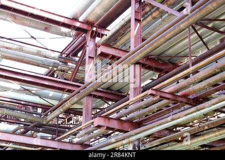 Pipeline overpass with iron pipes for pumping liquids with outlets and ...