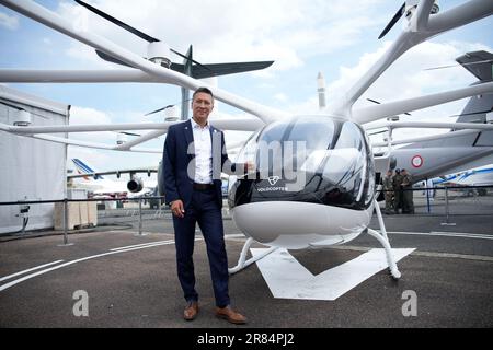 Volocopter CEO Dirk Hoke poses for a picture next to the Volocopter 2X ...