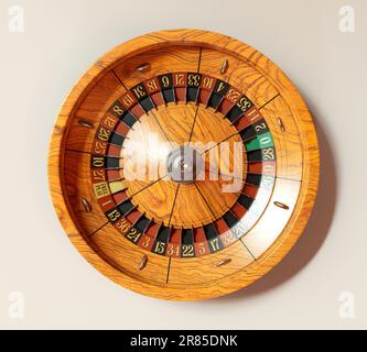 A closeup of a vintage antique roulette wheel with red and black ...