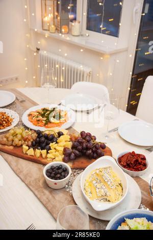 Traditional New Years feast. Decorated table with different kinds of ...