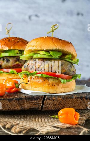 Plantain and black bean burger in brioche bun Stock Photo - Alamy