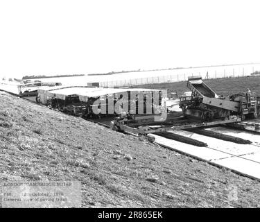 Construction of the M11 MotorwayRoad worker Stock Photo - Alamy