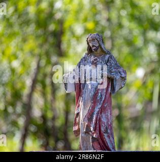 Sculptures of Catholic saints worn by time Stock Photo - Alamy