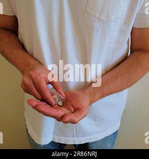Baggie with Tesla ecstasy pills in orange, green, and blue color shaped ...
