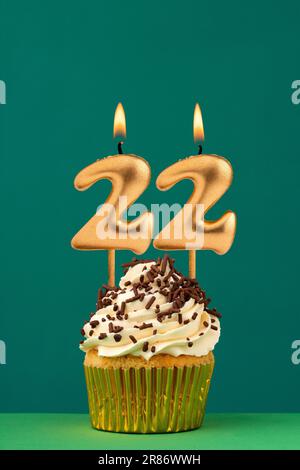 Green birthday candle - Candle number 22 Stock Photo - Alamy