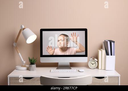 Internet addiction. Little girl trapped in computer. Child knocking on ...