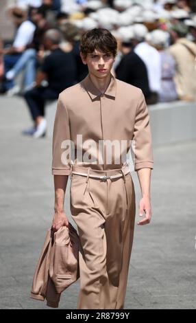 Milan, Italy. 19th June, 2023. A model presents a creation of SHANGHAI ...