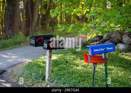 Rural mail boxes and paper tubes located in a small town Stock Photo ...