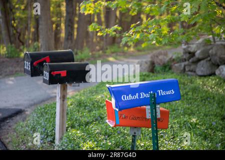 Rural mail boxes and paper tubes located in a small town Stock Photo ...