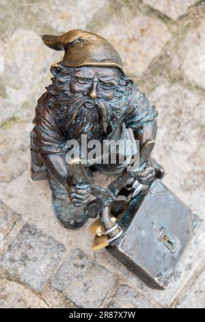 Dwarf with a padlock near bridge Stock Photo - Alamy