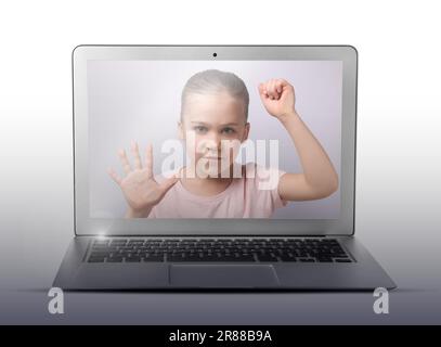 Internet addiction. Little girl trapped in computer. Child stuck to ...
