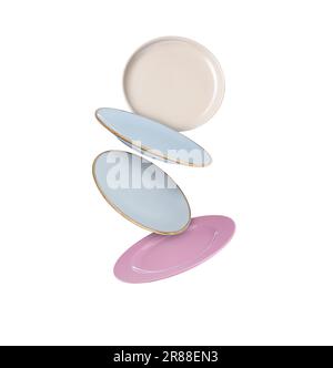 Many different plates falling on white background Stock Photo - Alamy