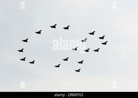 Eighteen Eurofighter Typhoon aircraft in formation spelling out CR ...