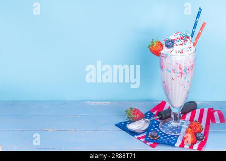 Patriotic USA American loaded milkshake, sweet dessert with red, white ...