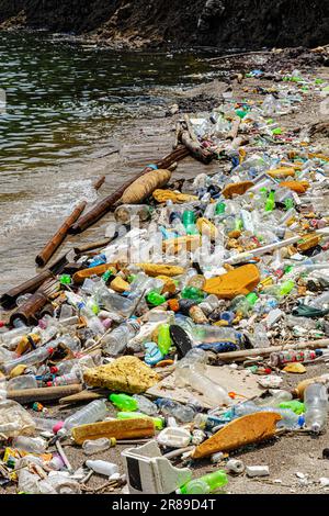 Manila Bay, Philippines, June 5, 2023 Plastic bottles of trash litter ...