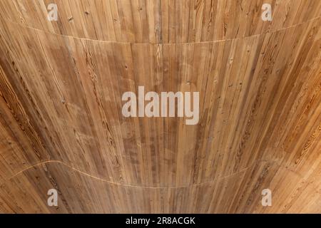 Bent ceiling made of wooden planks, parametric architecture background ...