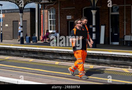 Grantham Train Station – Railway engineers or maintenance staff walking ...