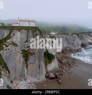 Hermitage of San Telmo with the Dragonstone cave under it in Zumaia ...
