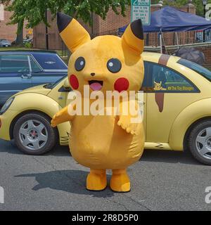A cosplayer dressed as Pokemon character Pikachu at the Dover Comic Con ...