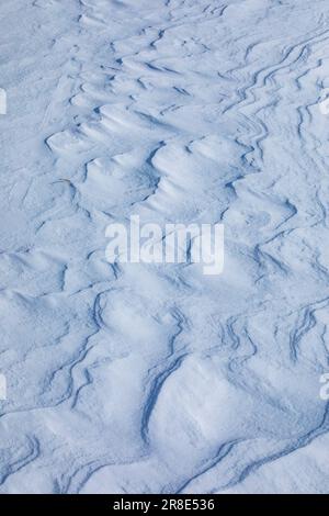 Abstract patterns on snow, full frame Stock Photo - Alamy