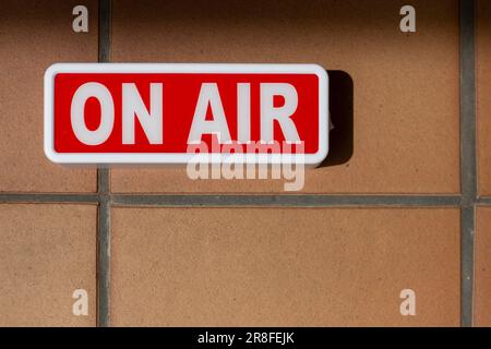 billboard signboard or indicator sign with the word "on air" written in ...