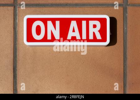 billboard signboard or indicator sign with the word "on air" written in ...