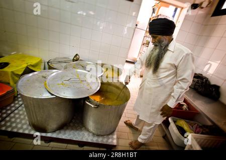 Pot with soup. Sikh community. Sikhdharma Gurdwara Singh Sabha ...