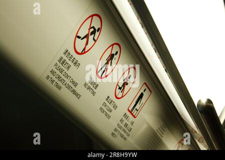 Prohibition signs and symbols in a subway station Stock Photo - Alamy
