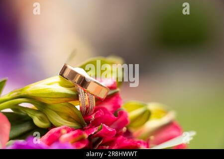 bridal bouquet and rings lie on a white sofa Stock Photo - Alamy