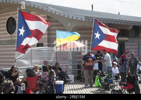 Puerto Rican flags fly with the Ukranian flag in the middle on the ...