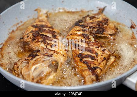 Clean and seasoned Peroá fish (Balistes capriscus) . Typical fish from ...