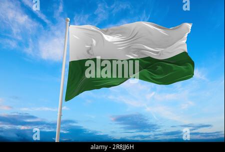 flag of German peoples Saxons at cloudy sky background, panoramic view ...