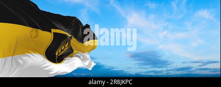 flag of German peoples Volga Germans at cloudy sky background ...