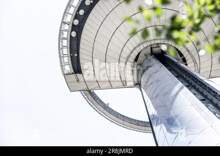 Circular metal and glass structure of the Moncloa lighthouse in Madrid ...