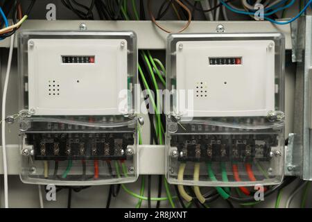 Electric meters and wires in fuse box Stock Photo - Alamy