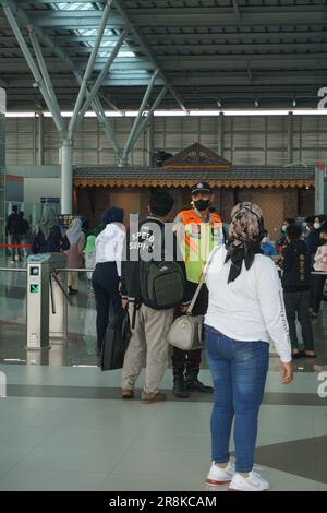 you can see the train security giving instructions to train passengers ...
