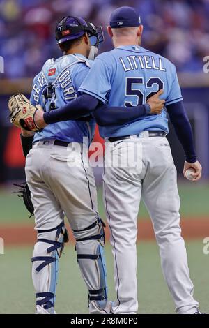 Tampa Bay Rays catcher Christian Bethancourt holds the helmet of ...