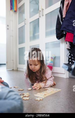 Long haired blonde girl doing acrobatics in autumn park Stock Photo - Alamy