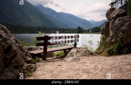 Benches in the bavarian alps, at the Hintersee Stock Photo - Alamy