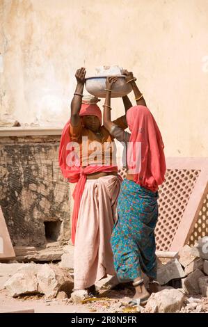 Indian women carrying stones on their head Amber Fort Jaipur Rajasthan ...