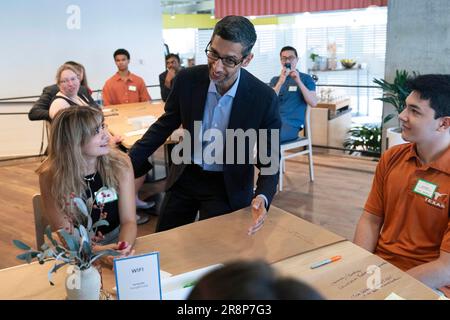 Google CEO Sundar Pichai greets college students during a workshop at ...
