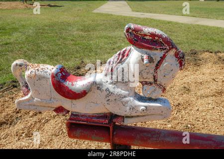 Old park playground spring rocker, rocking, equipment Stock Photo - Alamy