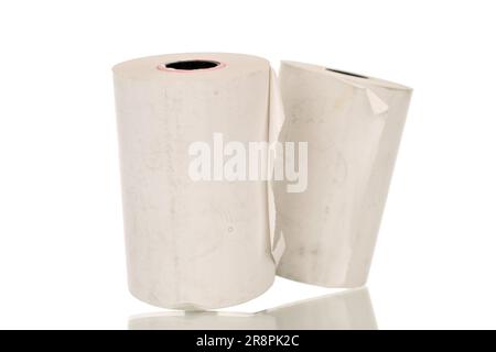 Two rolls of paper cash register tape, close-up isolated on white ...