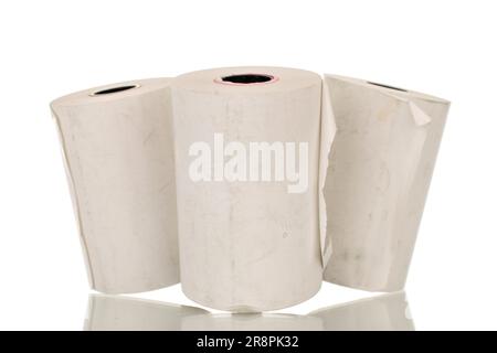 Three rolls of paper cash register tape, close-up isolated on white ...