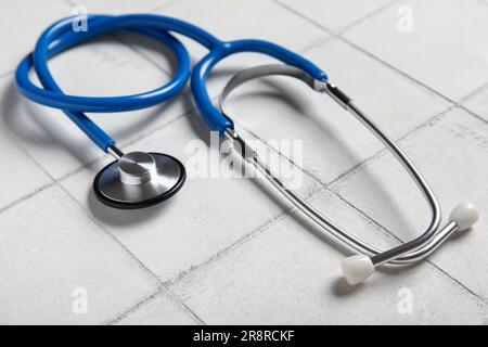 Modern stethoscope on light background Stock Photo - Alamy