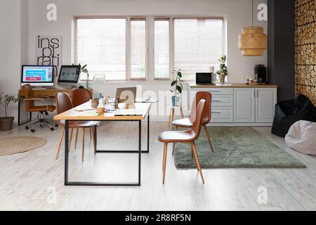 Interior of office with graphic designer's workplaces Stock Photo - Alamy