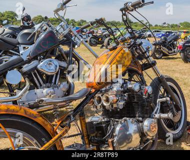 An eye catching chopper in line at a motorcycle rally. The chopper is ...
